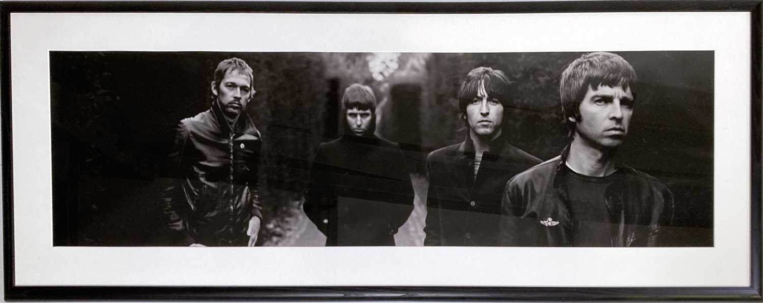 Lot 2020475 - OASIS - A LARGE FRAMED PORTRAIT BY